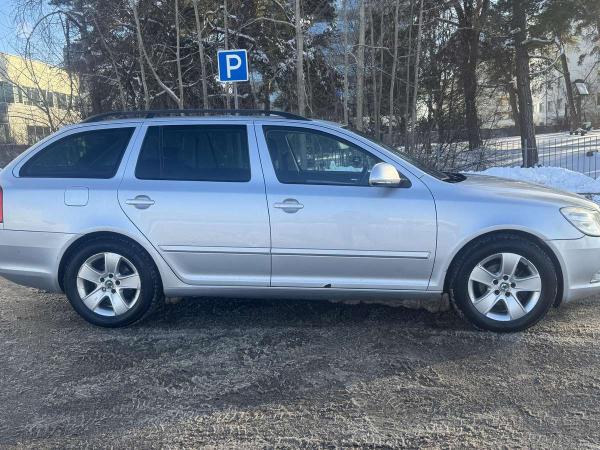 Grey Skoda Octavia 2010 in Moletai, with an engine capacity of 1.80 L and mileage of 272 thousand km for 2950 €, photo 5 on AUTOMOTO.COM.LV
