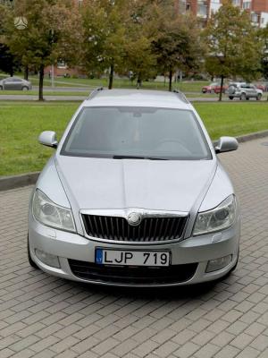 Grey Skoda Octavia 2011 in Vilnius, with an engine capacity of 2.00 L and mileage of 290 thousand km for 2900 €, photo 4 on AUTOMOTO.COM.LV
