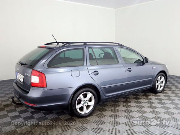 Grey Skoda Octavia 2012 in Tallinn, with an engine capacity of 1.40 L and mileage of 254 thousand km for 1499 €, photo 3 on AUTOMOTO.COM.LV
