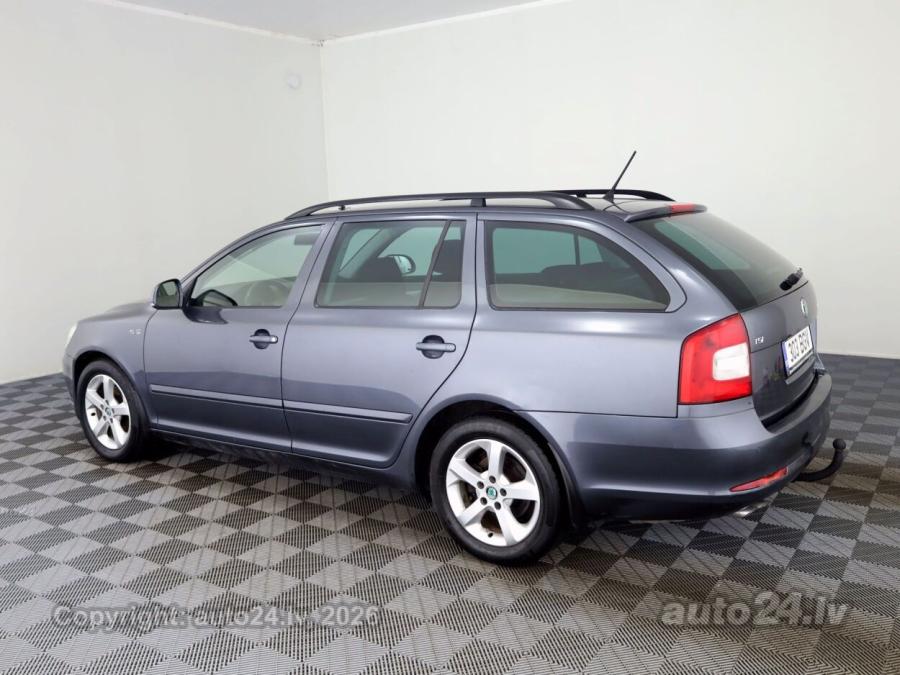 Grey Skoda Octavia 2012 in Tallinn, with an engine capacity of 1.40 L and mileage of 254 thousand km for 1499 €, photo 4 on AUTOMOTO.COM.LV