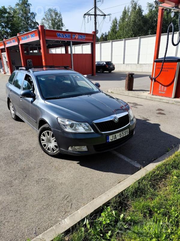 Grey Skoda Octavia 2012 in Riga, with an engine capacity of 1.40 L and mileage of 200 thousand km for 2400 €, photo 3 on AUTOMOTO.COM.LV