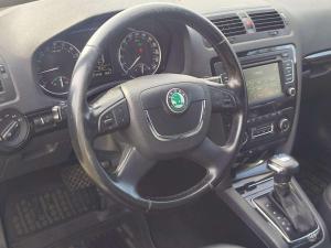 Grey Skoda Octavia 2012 in Siauliai, with an engine capacity of 2.00 L and mileage of 227 thousand km for 6700 €, photo 14 on AUTOMOTO.COM.LV