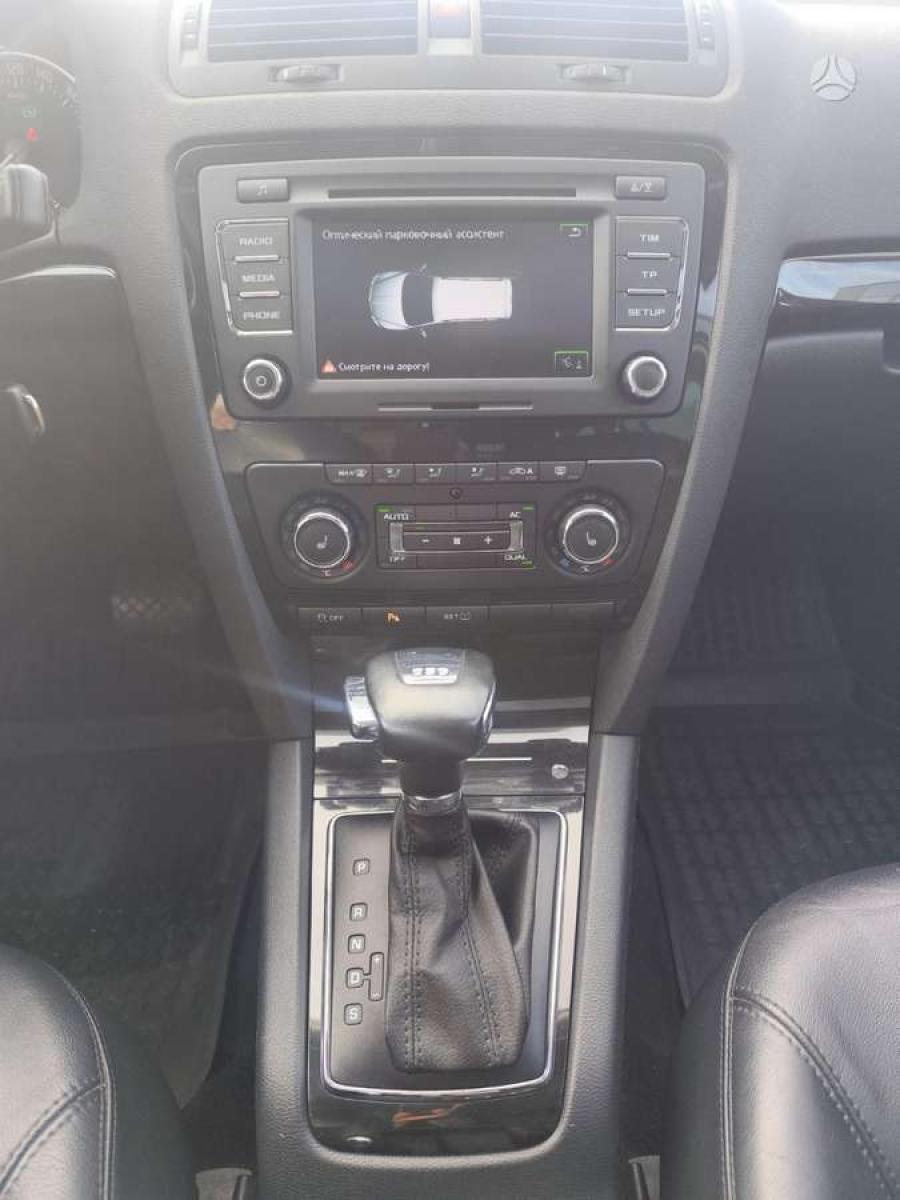 Grey Skoda Octavia 2012 in Siauliai, with an engine capacity of 2.00 L and mileage of 227 thousand km for 6700 €, photo 15 on AUTOMOTO.COM.LV