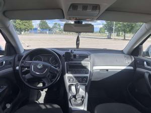 Grey Skoda Octavia 2013 in Klaipeda, with an engine capacity of 1.60 L and mileage of 353 thousand km for 1900 €, photo 8 on AUTOMOTO.COM.LV