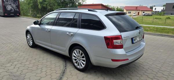Grey Skoda Octavia 2014 in Vilnius, with an engine capacity of 1.97 L and mileage of 245 thousand km for 6700 €, photo 6 on AUTOMOTO.COM.LV