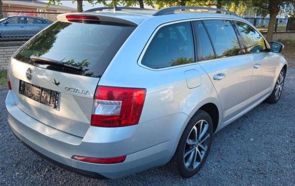 Grey Skoda Octavia 2014 in Vilnius, with an engine capacity of 1.60 L and mileage of 236 thousand km for 6800 €, photo 3 on AUTOMOTO.COM.LV
