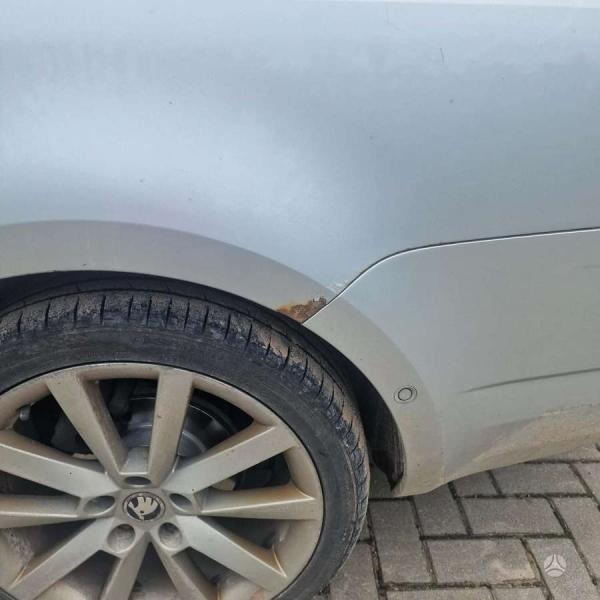 Grey Skoda Octavia 2014 in Vilnius, with an engine capacity of 1.20 L and mileage of 377 thousand km for 3200 €, photo 4 on AUTOMOTO.COM.LV