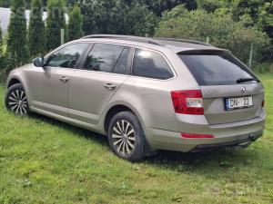 Grey Skoda Octavia 2014 in Liepaja, with an engine capacity of 2.00 L and mileage of 199 thousand km for 6600 €, photo 14 on AUTOMOTO.COM.LV