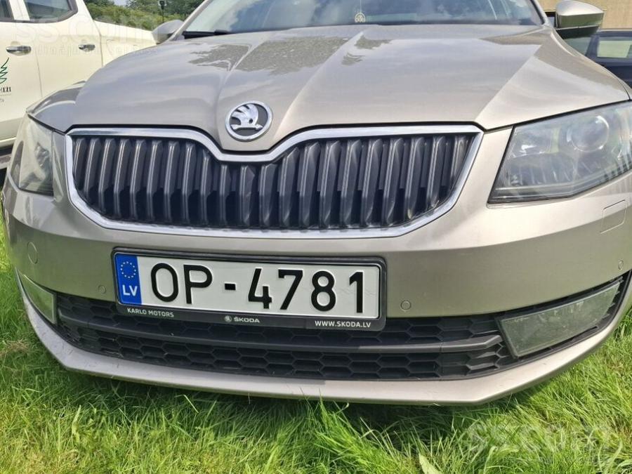 Grey Skoda Octavia 2014 in Liepaja, with an engine capacity of 2.00 L and mileage of 199 thousand km for 5800 €, photo 5 on AUTOMOTO.COM.LV