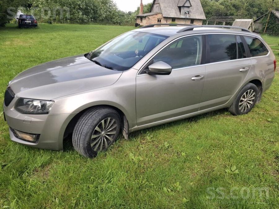 Grey Skoda Octavia 2014 in Liepaja, with an engine capacity of 2.00 L and mileage of 199 thousand km for 5800 €, photo 8 on AUTOMOTO.COM.LV