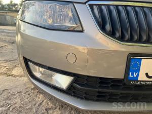 Grey Skoda Octavia 2014 in Riga, with an engine capacity of 1.60 L and mileage of 285 thousand km for 4400 €, photo 14 on AUTOMOTO.COM.LV
