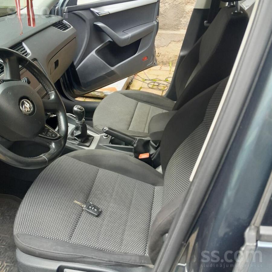 Grey Skoda Octavia 2014 in Riga, with an engine capacity of 2.00 L and mileage of 259 thousand km for 4500 €, photo 7 on AUTOMOTO.COM.LV
