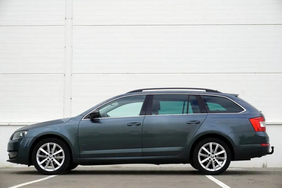 Grey Skoda Octavia 2015 in Riga, with an engine capacity of 2.00 L and mileage of 240 thousand km for 6600 €, photo 7 on AUTOMOTO.COM.LV
