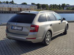 Grey Skoda Octavia 2015 in Liepaja, with an engine capacity of 2.00 L and mileage of 215 thousand km for 8500 €, photo 5 on AUTOMOTO.COM.LV