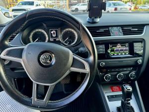 Grey Skoda Octavia 2015 in Vilnius, with an engine capacity of 1.60 L and mileage of 253 thousand km for 6900 €, photo 5 on AUTOMOTO.COM.LV