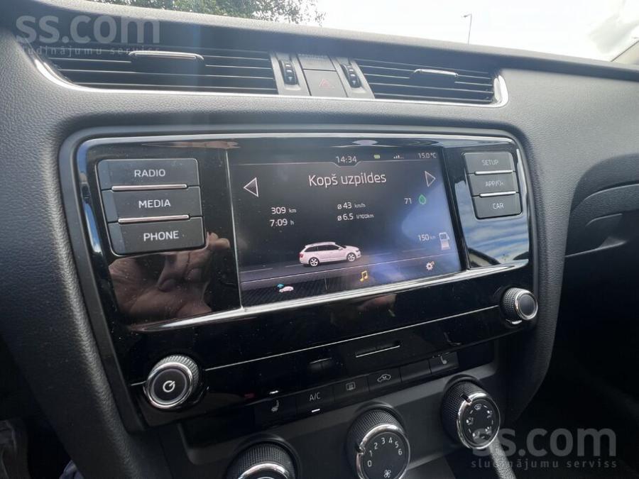 Grey Skoda Octavia 2015 in Riga, with an engine capacity of 1.40 L and mileage of 214 thousand km for 7650 €, photo 12 on AUTOMOTO.COM.LV