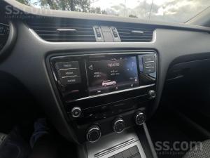Grey Skoda Octavia 2015 in Riga, with an engine capacity of 1.40 L and mileage of 214 thousand km for 7650 €, photo 13 on AUTOMOTO.COM.LV