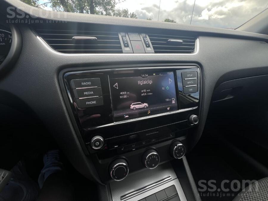 Grey Skoda Octavia 2015 in Riga, with an engine capacity of 1.40 L and mileage of 214 thousand km for 7650 €, photo 13 on AUTOMOTO.COM.LV