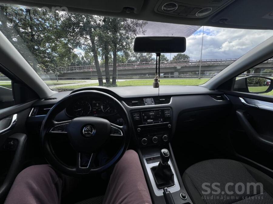 Grey Skoda Octavia 2015 in Riga, with an engine capacity of 1.40 L and mileage of 214 thousand km for 7650 €, photo 14 on AUTOMOTO.COM.LV