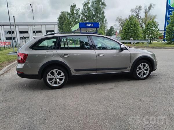 Grey Skoda Octavia 2016 in Riga, with an engine capacity of 2.00 L and mileage of 238 thousand km for 8990 €, photo 7 on AUTOMOTO.COM.LV