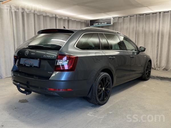 Grey Skoda Octavia 2020 in Riga, with an engine capacity of 2.00 L and mileage of 222 thousand km for 12990 €, photo 6 on AUTOMOTO.COM.LV