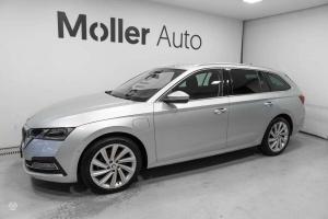 Grey Skoda Octavia 2021 in Vilnius, with an engine capacity of 1.40 L and mileage of 141 thousand km for 18950 €, photo 3 on AUTOMOTO.COM.LV