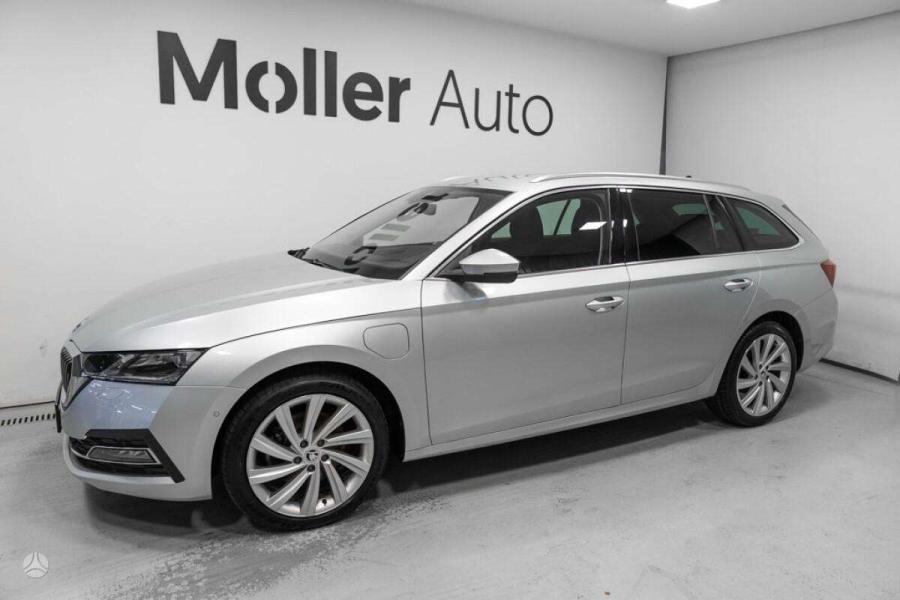 Grey Skoda Octavia 2021 in Vilnius, with an engine capacity of 1.40 L and mileage of 141 thousand km for 18950 €, photo 3 on AUTOMOTO.COM.LV