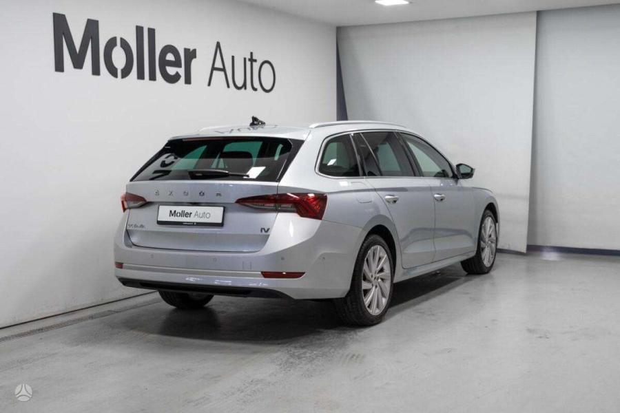 Grey Skoda Octavia 2021 in Vilnius, with an engine capacity of 1.40 L and mileage of 141 thousand km for 18950 €, photo 4 on AUTOMOTO.COM.LV