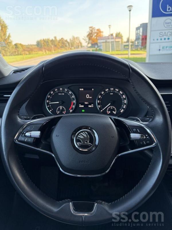 Grey Skoda Octavia 2023 in Riga, with an engine capacity of 2.00 L and mileage of 83 thousand km for 16300 €, photo 9 on AUTOMOTO.COM.LV
