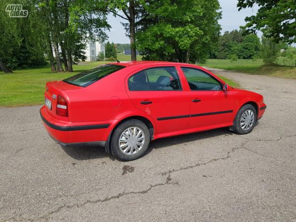 Sarkans Skoda Octavia 1998 Viļņa, ar dzinēja tilpumu 1.90 L un nobraukumu 290 tūkst. km par 950 €, foto 6 vietnē AUTOMOTO.COM.LV