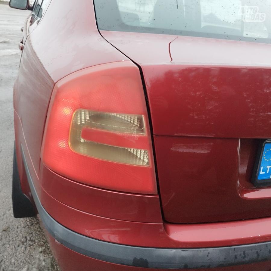 Sarkans Skoda Octavia 2006 Šauļi, ar dzinēja tilpumu 1.90 L un nobraukumu 360 tūkst. km par 1390 €, foto 12 vietnē AUTOMOTO.COM.LV