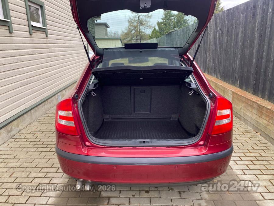 Red Skoda Octavia 2008 in Tallinn, with an engine capacity of 2.00 L and mileage of 269 thousand km for 4290 €, photo 6 on AUTOMOTO.COM.LV