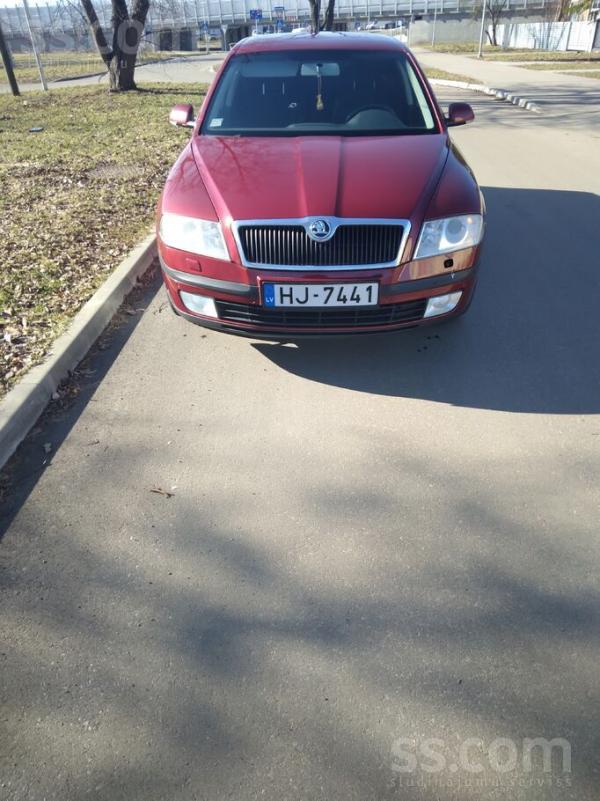 Red Skoda Octavia 2009 in Riga, with an engine capacity of 1.90 L and mileage of 328 thousand km for 2450 €, photo 3 on AUTOMOTO.COM.LV
