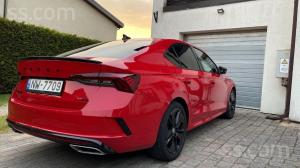Red Skoda Octavia 2021 in Riga, with an engine capacity of 2.00 L and mileage of 104 thousand km for 24900 €, photo  on AUTOMOTO.COM.LV