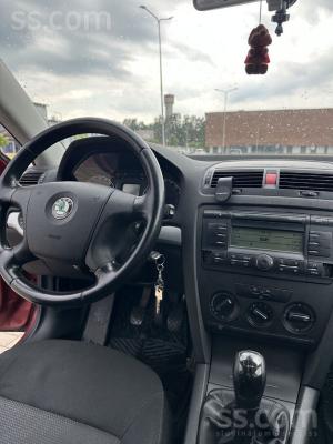 Sarkans Skoda Octavia 2007 Rīga, ar dzinēja tilpumu 2.00 L un nobraukumu 307 tūkst. km par 1800 €, foto 12 vietnē AUTOMOTO.COM.LV