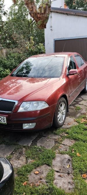 Sarkans Skoda Octavia 2008 Rīga, ar dzinēja tilpumu 1.60 L un nobraukumu 139 tūkst. km par 1000 €, foto  vietnē AUTOMOTO.COM.LV