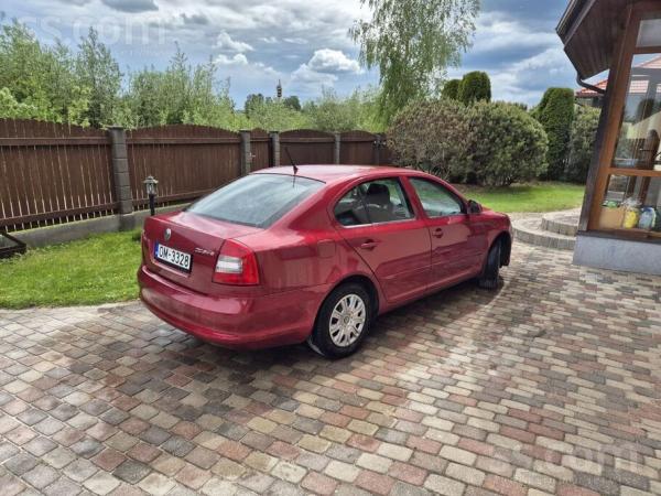 Red Skoda Octavia 2011 in Riga, with an engine capacity of 1.40 L and mileage of 208 thousand km for 3400 €, photo 4 on AUTOMOTO.COM.LV