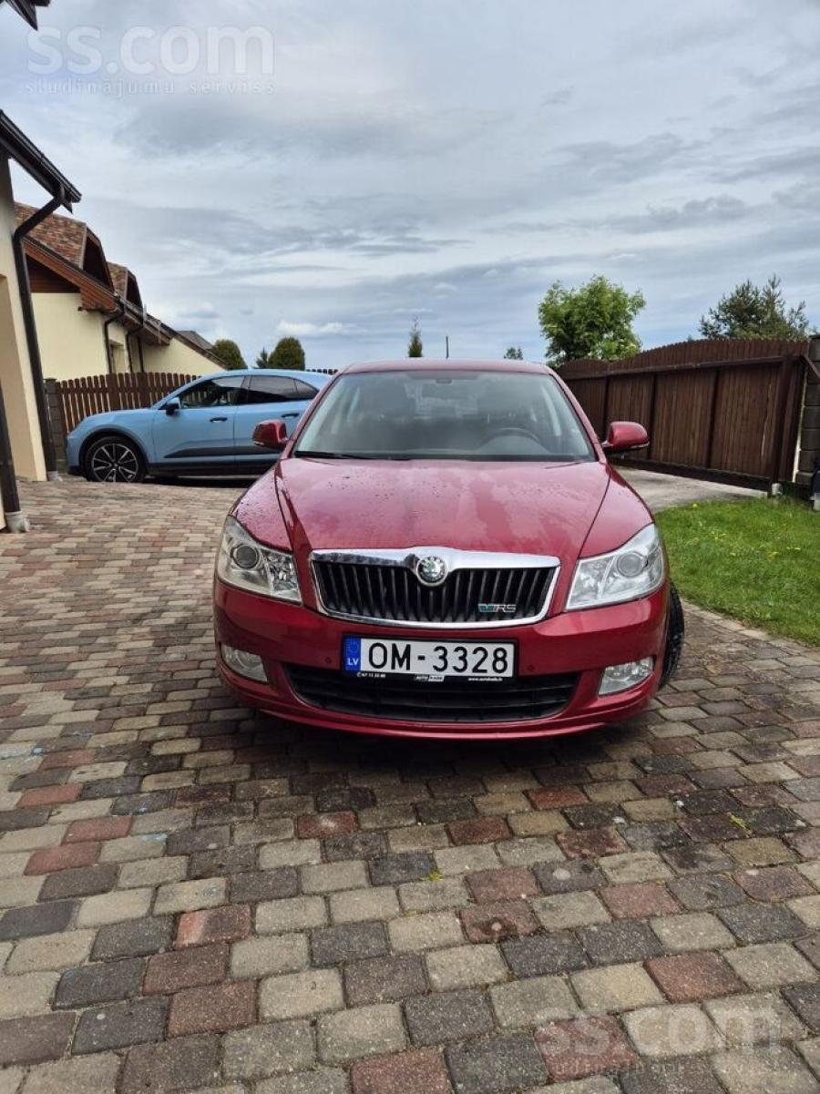 Red Skoda Octavia 2011 in Riga, with an engine capacity of 1.40 L and mileage of 208 thousand km for 1200 €, photo 3 on AUTOMOTO.COM.LV