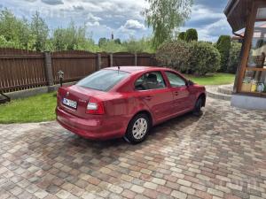 Red Skoda Octavia 2011 in Riga, with an engine capacity of 1.40 L and mileage of 208 thousand km for 1200 €, photo 5 on AUTOMOTO.COM.LV