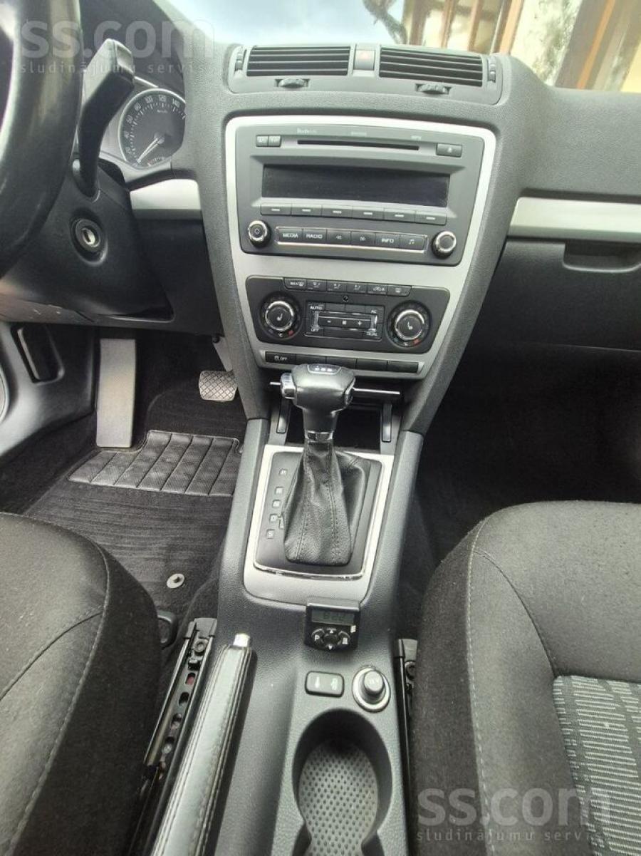 Red Skoda Octavia 2011 in Riga, with an engine capacity of 1.40 L and mileage of 208 thousand km for 1200 €, photo 6 on AUTOMOTO.COM.LV