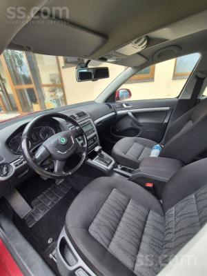 Red Skoda Octavia 2011 in Riga, with an engine capacity of 1.40 L and mileage of 208 thousand km for 1200 €, photo 9 on AUTOMOTO.COM.LV