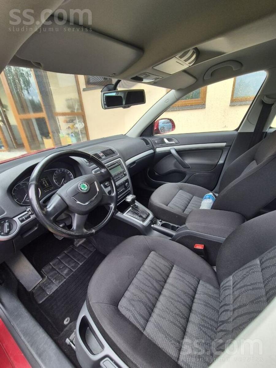 Red Skoda Octavia 2011 in Riga, with an engine capacity of 1.40 L and mileage of 208 thousand km for 1200 €, photo 9 on AUTOMOTO.COM.LV
