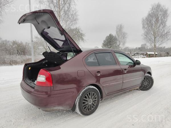 Red Skoda Octavia 2012 in Riga, with an engine capacity of 1.60 L and mileage of 271 thousand km for 2850 €, photo 6 on AUTOMOTO.COM.LV