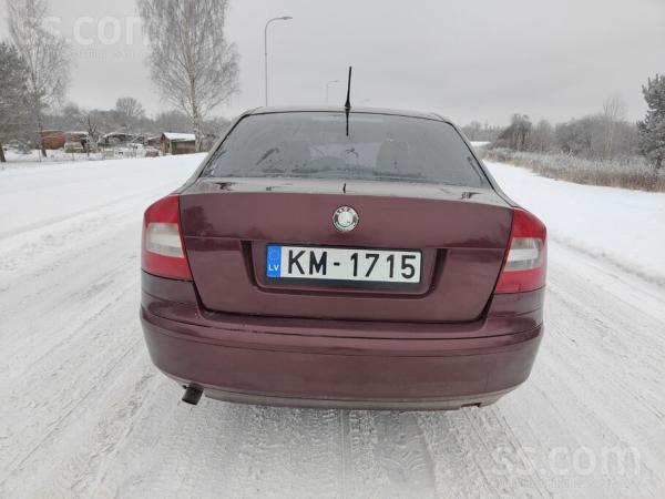 Red Skoda Octavia 2012 in Riga, with an engine capacity of 1.60 L and mileage of 271 thousand km for 2850 €, photo 8 on AUTOMOTO.COM.LV