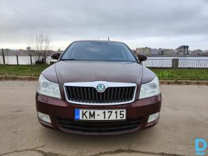 Sarkans Skoda Octavia 2012 Rīga, ar dzinēja tilpumu 1.60 L un nobraukumu 273 tūkst. km par 3200 €, foto  vietnē AUTOMOTO.COM.LV