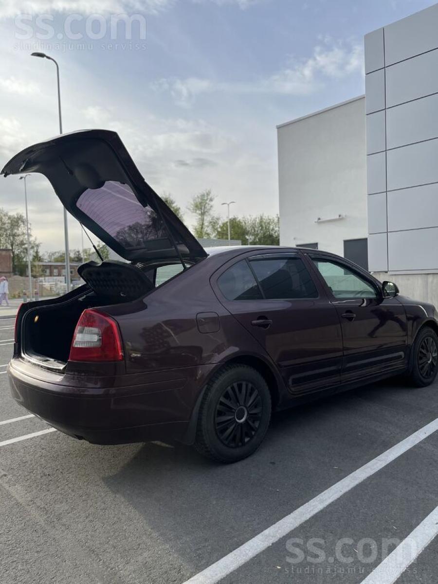Red Skoda Octavia 2012 in Riga, with an engine capacity of 1.60 L and mileage of 274 thousand km for 2699 €, photo 6 on AUTOMOTO.COM.LV