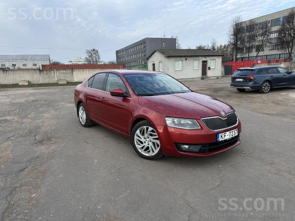 Red Skoda Octavia 2014 in Riga, with an engine capacity of 2.00 L and mileage of 240 thousand km for 5700 €, photo 1 on AUTOMOTO.COM.LV
