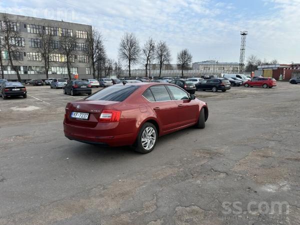 Red Skoda Octavia 2014 in Riga, with an engine capacity of 2.00 L and mileage of 240 thousand km for 5600 €, photo 2 on AUTOMOTO.COM.LV