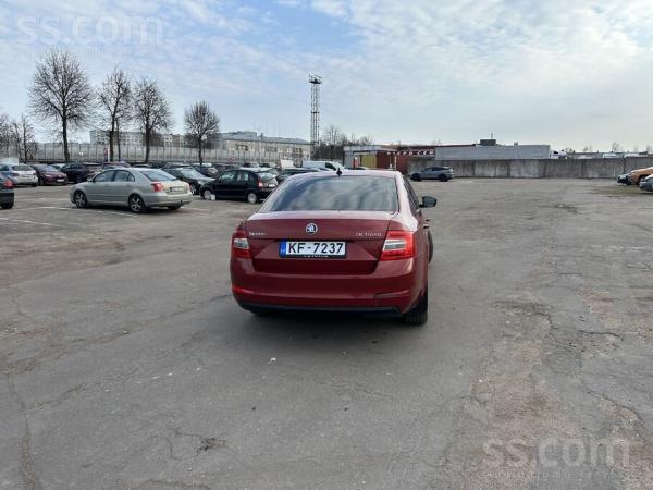 Red Skoda Octavia 2014 in Riga, with an engine capacity of 2.00 L and mileage of 240 thousand km for 5600 €, photo 3 on AUTOMOTO.COM.LV