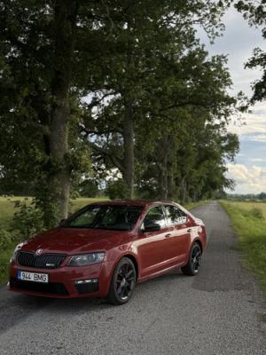 Sarkans Skoda Octavia 2014 Valga, ar dzinēja tilpumu 2.00 L un nobraukumu 201 tūkst. km par 7999 €, foto  vietnē AUTOMOTO.COM.LV